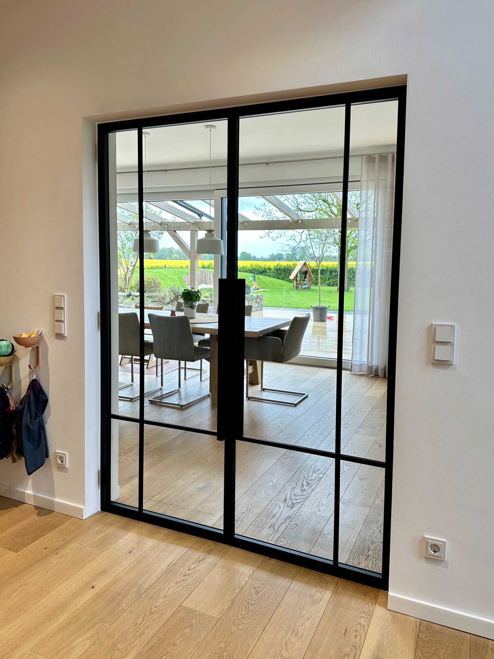 Double-leaf Door with Clear Glass as a Passageway to the Open-Plan ...